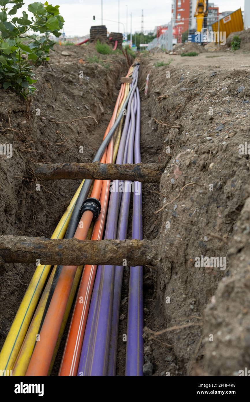 underground electric cable infrastructure installation. Construction ...