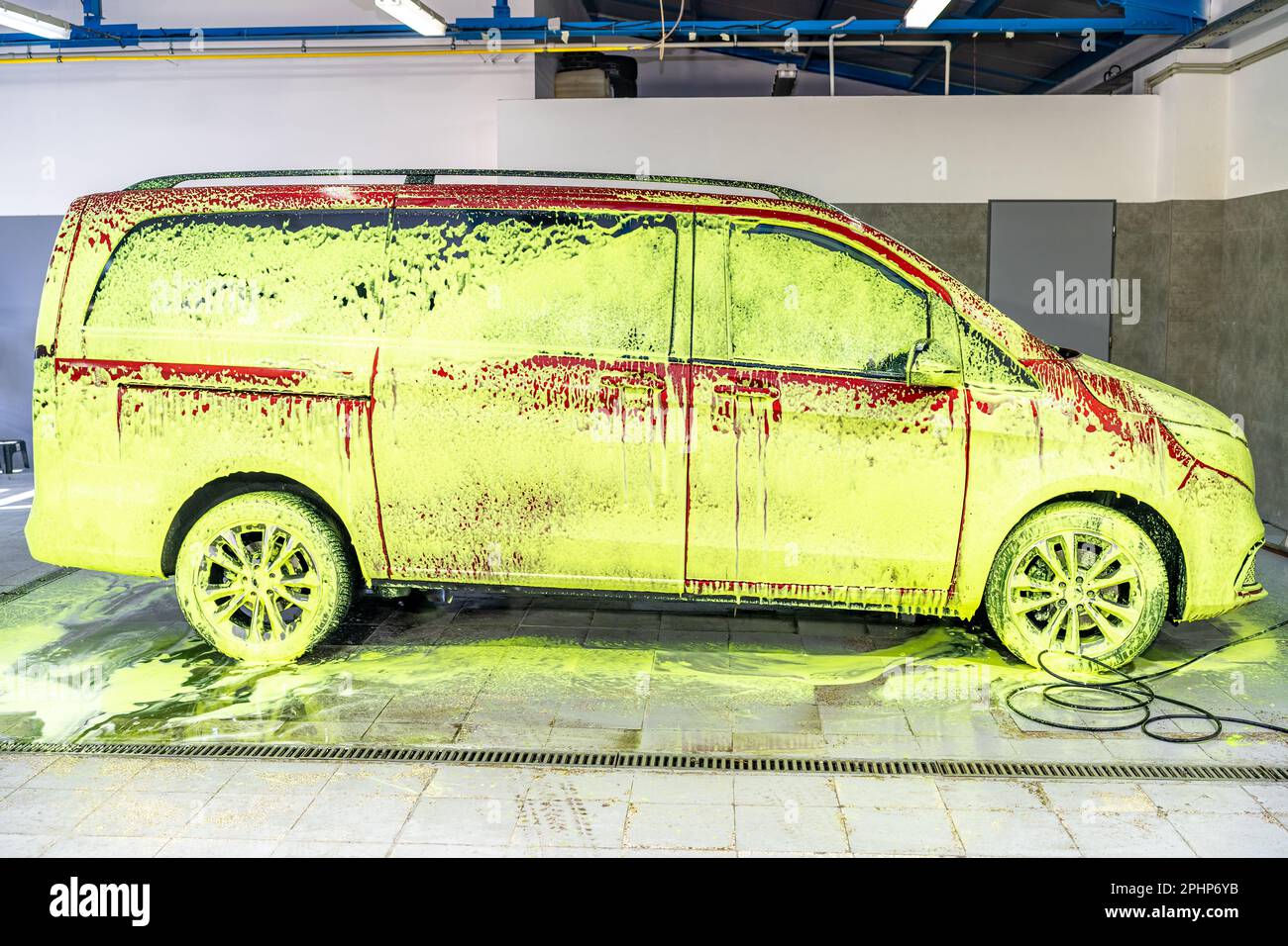 wash cars with green active foam in the garage Stock Photo - Alamy