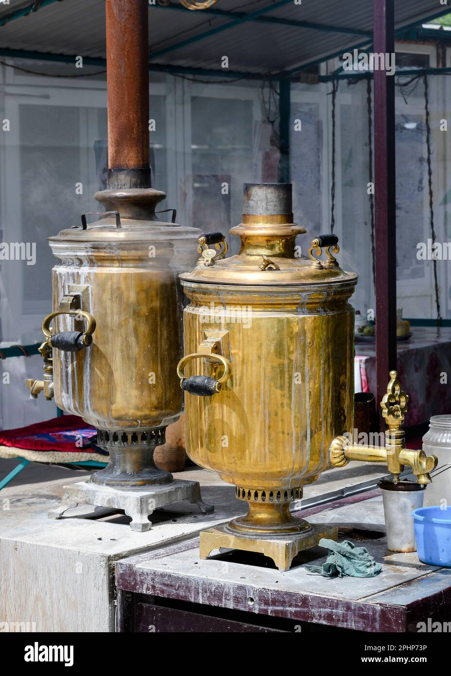 Samovars with a century-old history prepare tea in a rural teahouse in ...