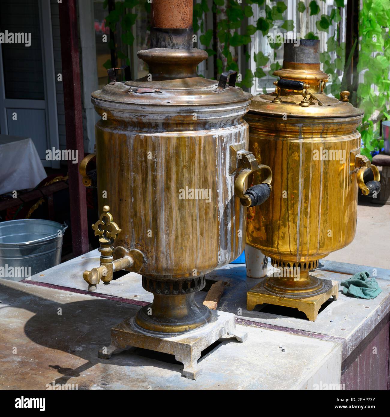Samovars with a century-old history prepare tea in a rural teahouse in ...