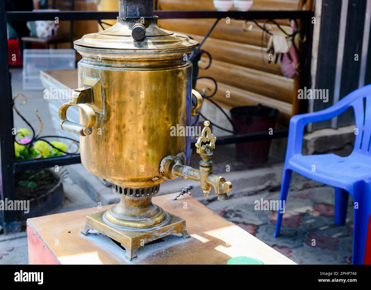 Samovars with a century-old history prepare tea in a rural teahouse in ...