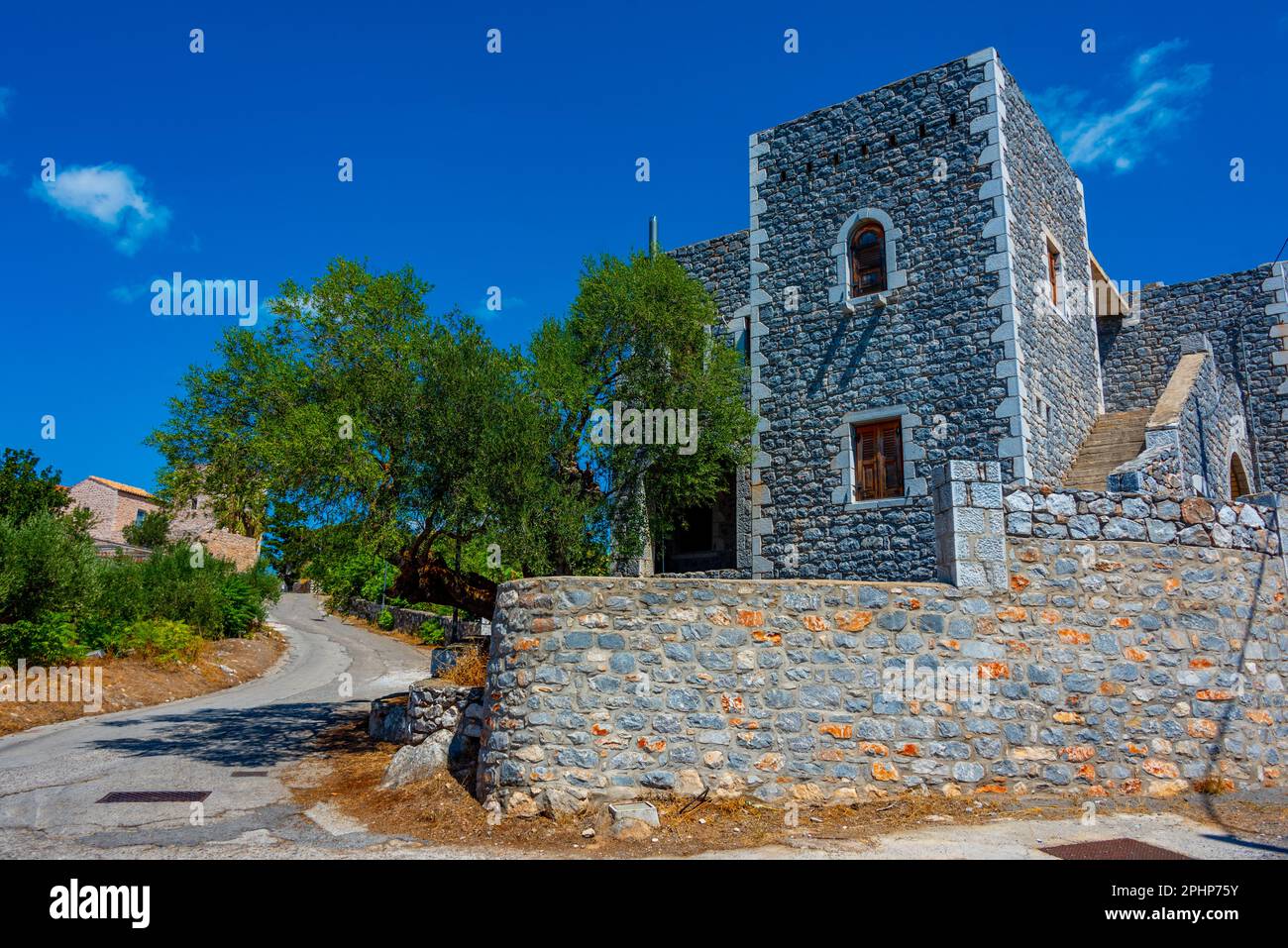 Traditional Mani towers at Greek town Aeropoli Stock Photo - Alamy