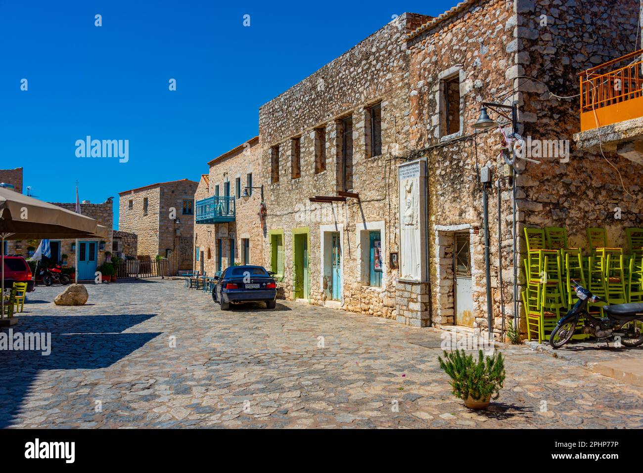 Summer day on the main square of Areopoli, Greece Stock Photo - Alamy