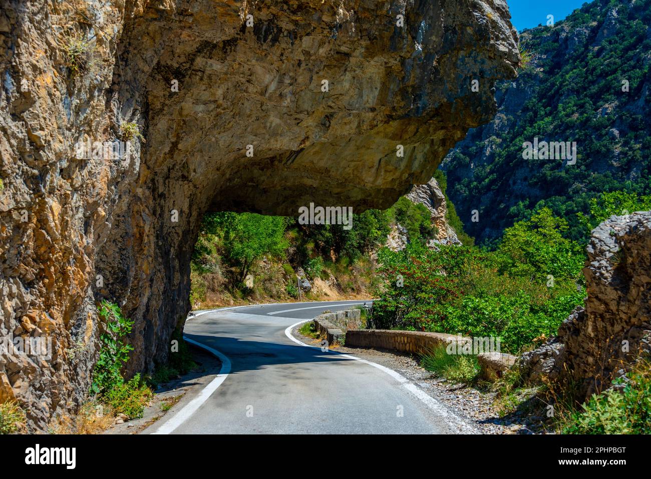 Tunnel at a road passing through Langada pass in Greece Stock Photo - Alamy