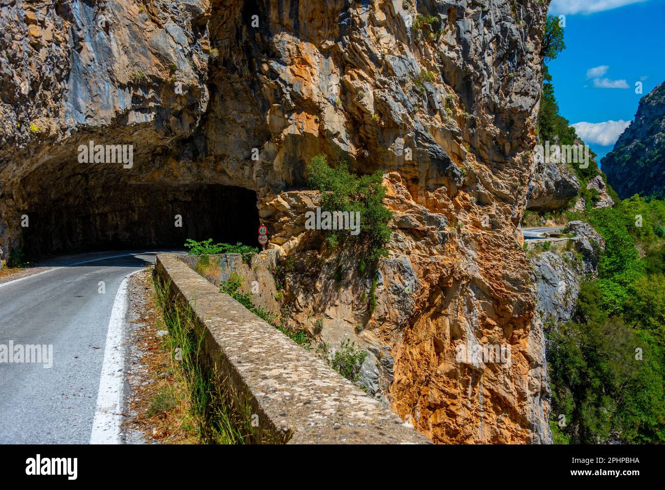 Tunnel at a road passing through Langada pass in Greece Stock Photo - Alamy
