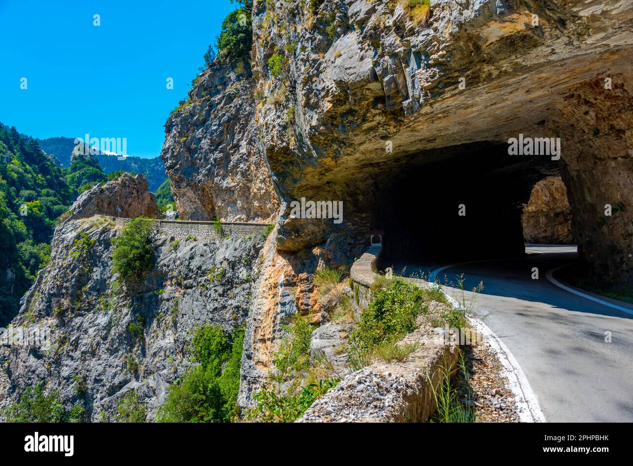 Tunnel at a road passing through Langada pass in Greece Stock Photo - Alamy
