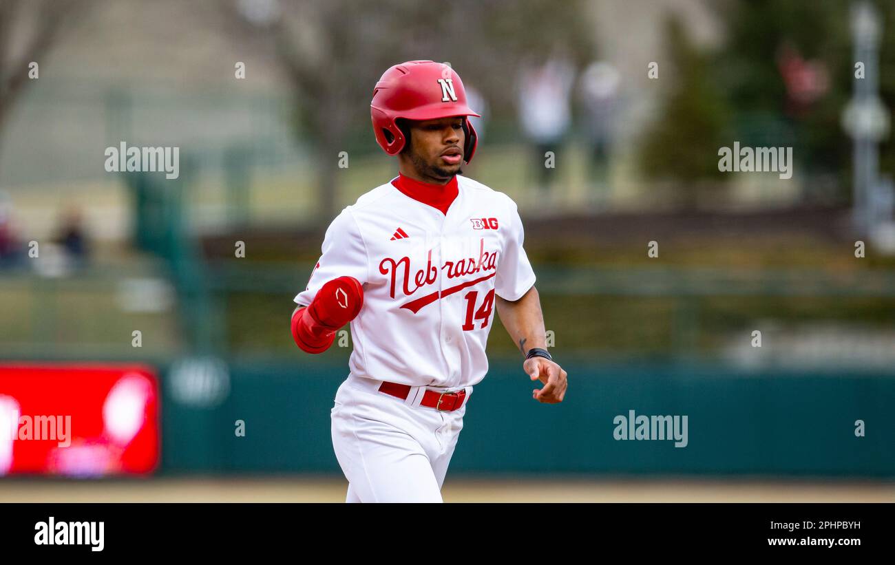 Nebraska's Brice Matthews (14) runs home against Illinois during an ... Nebraska's Brice Matthews (14) runs home against Illinois during an ...