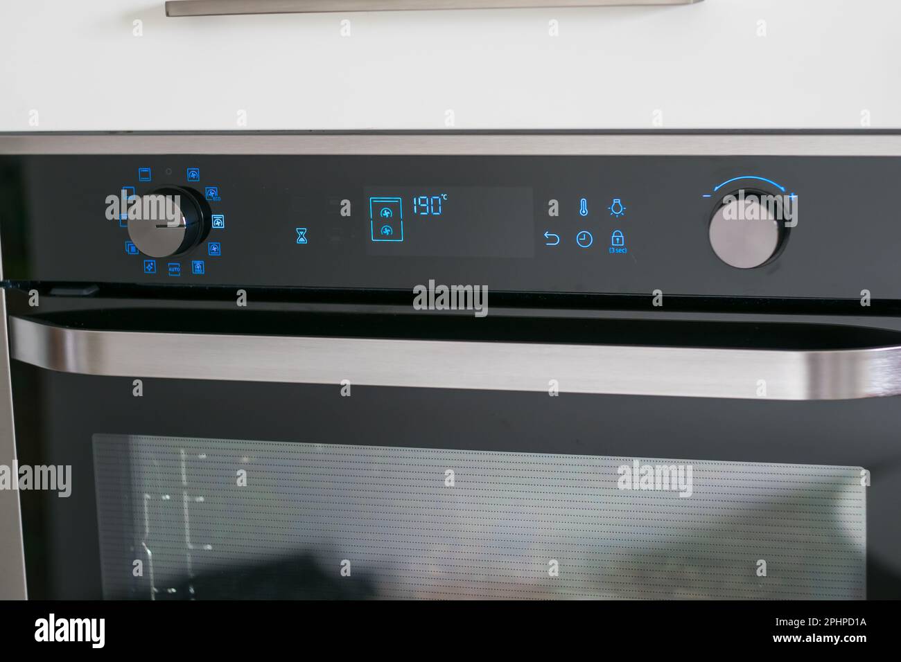 Oven View of a black oven with a silver handle Stock Photo - Alamy