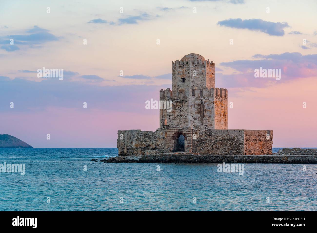 Sunset view of Bourtzi of Methoni Castle in Greece Stock Photo - Alamy