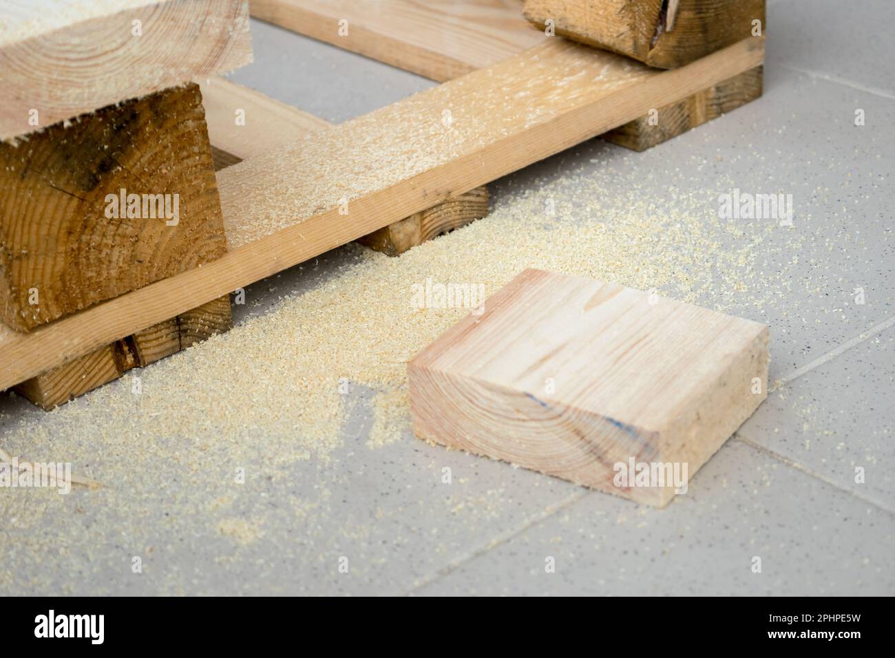 A piece of cut pine plank lying on the floor Stock Photo - Alamy