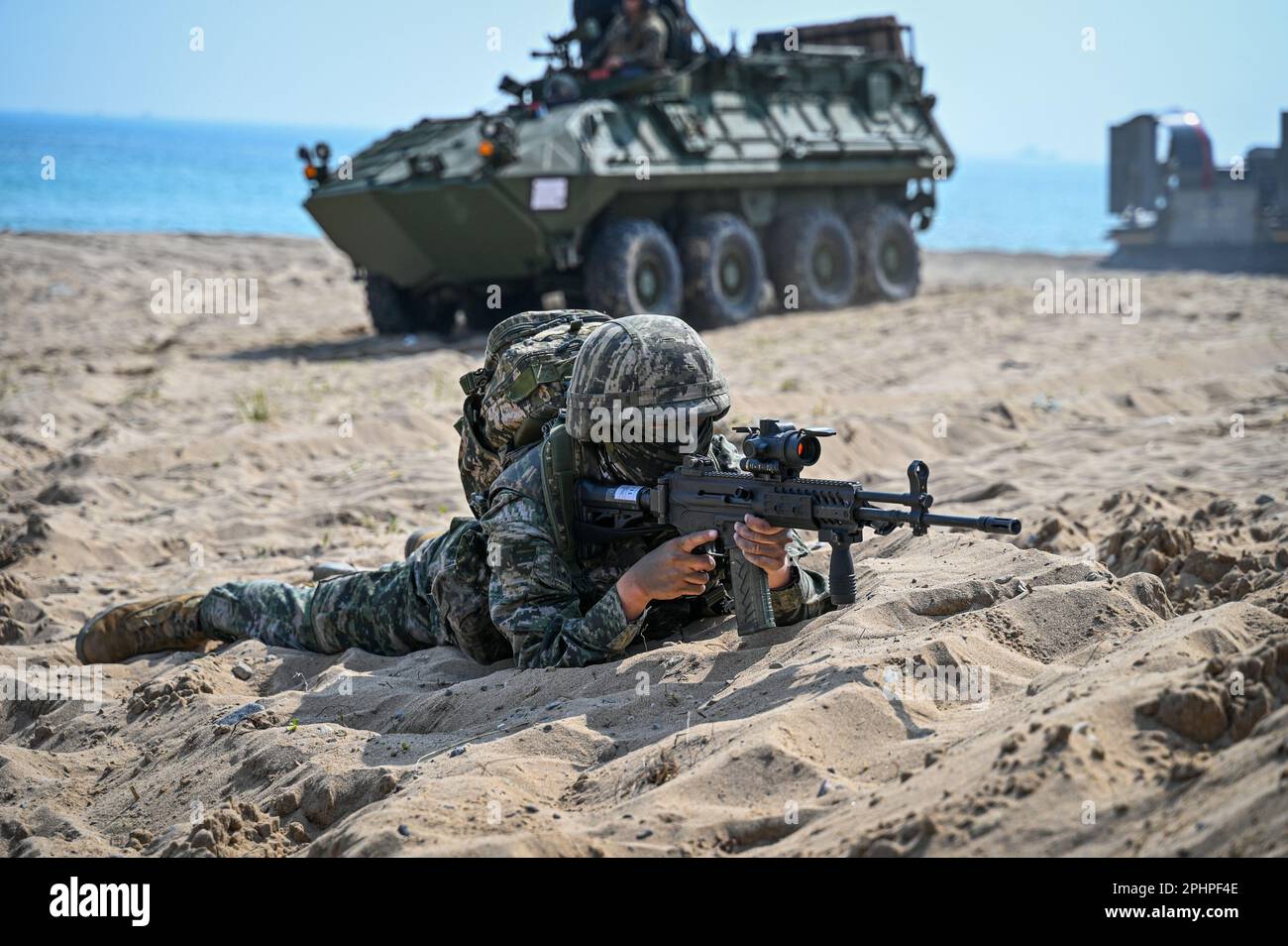Pohang, South Korea. 29th Mar, 2023. A South Korean marine aims a ...