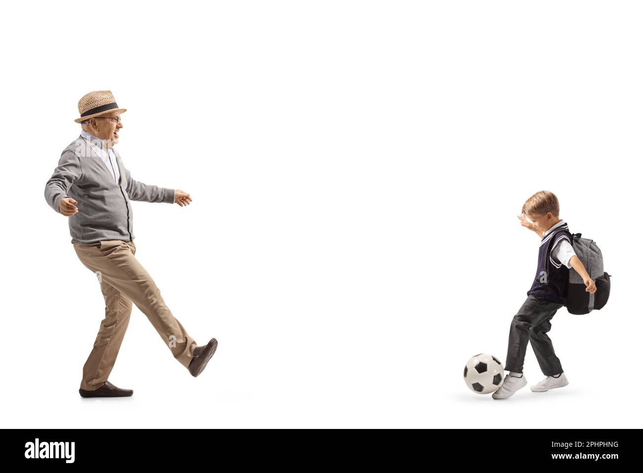 Little boy playing football with his grandfather isolated on white ...
