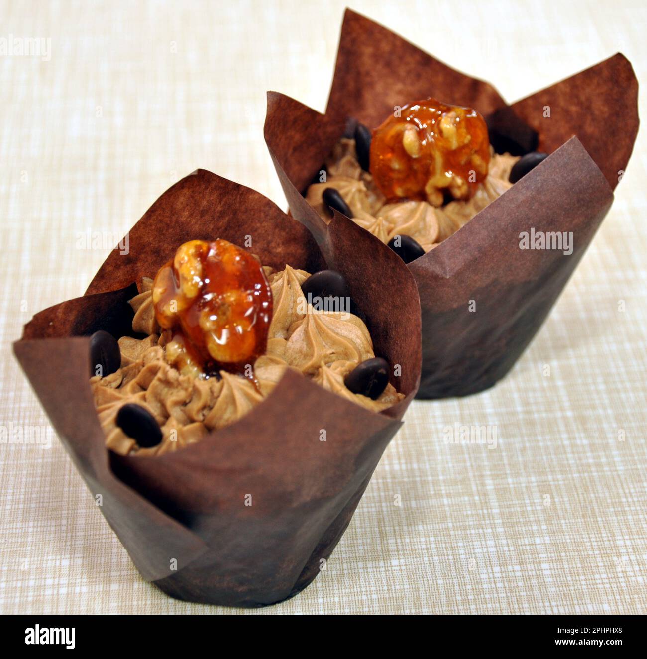 Chocolate Cakes in Brown wrappers Stock Photo - Alamy
