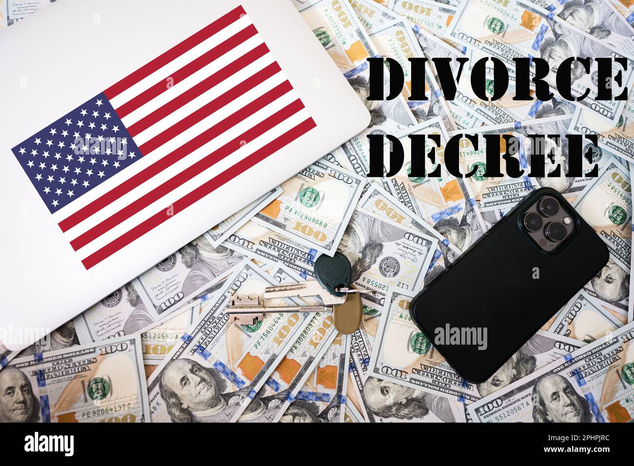 Divorce decree concept. USA flag, dollar money with keys, laptop and ...