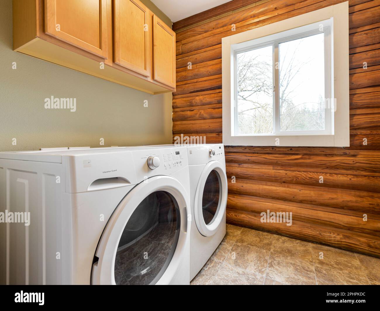 Modern residential laundry room interior Stock Photo - Alamy