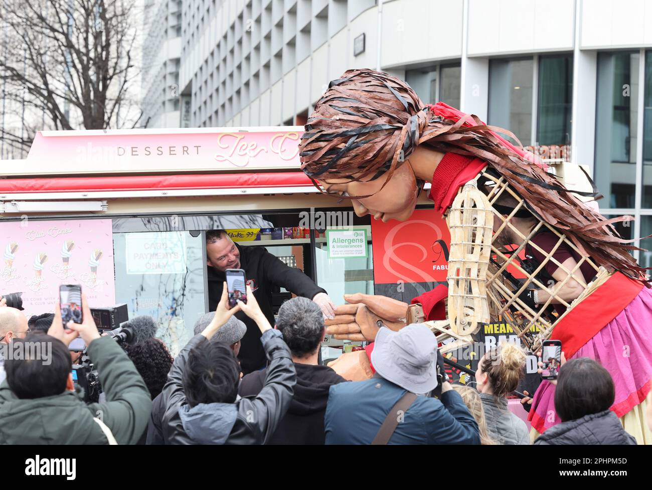 London, UK, 29th March 2023. Little Amal, the 12 foot puppet of a 10 ...