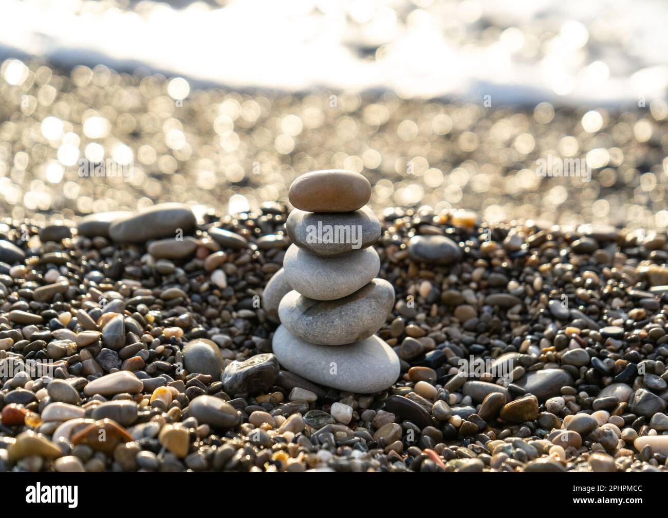 Stone pyramid. Pebbles balance pile, harmony zen stones, balance stack ...