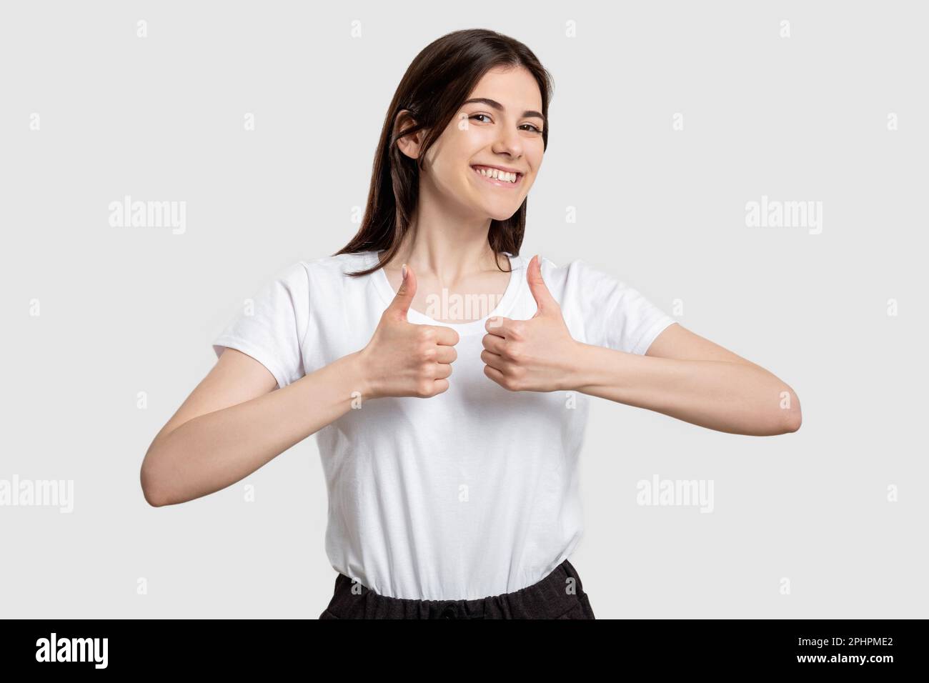 Woman showing thumbs up like hi-res stock photography and images - Alamy