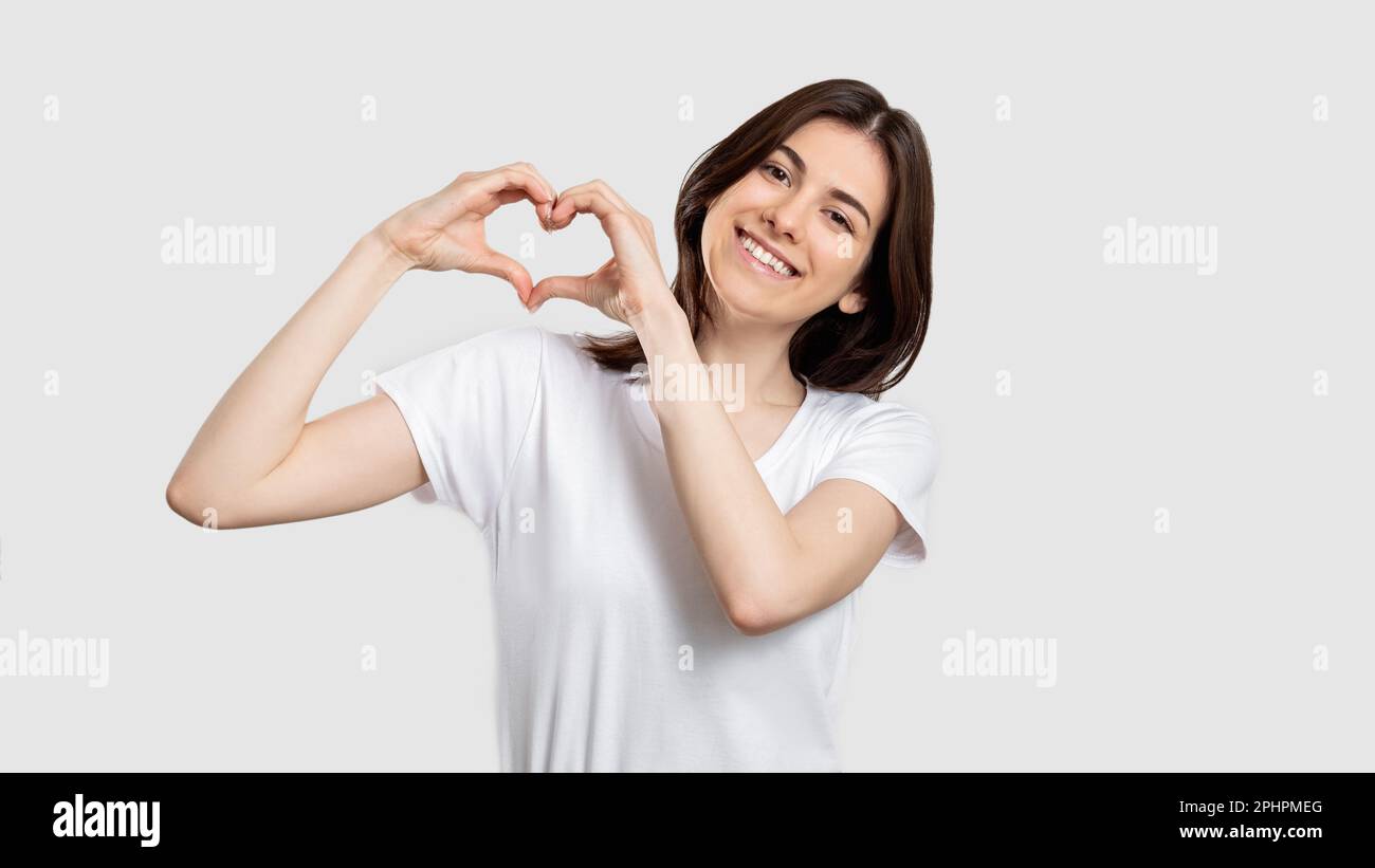 love sign compassion support woman heart gesture Stock Photo - Alamy