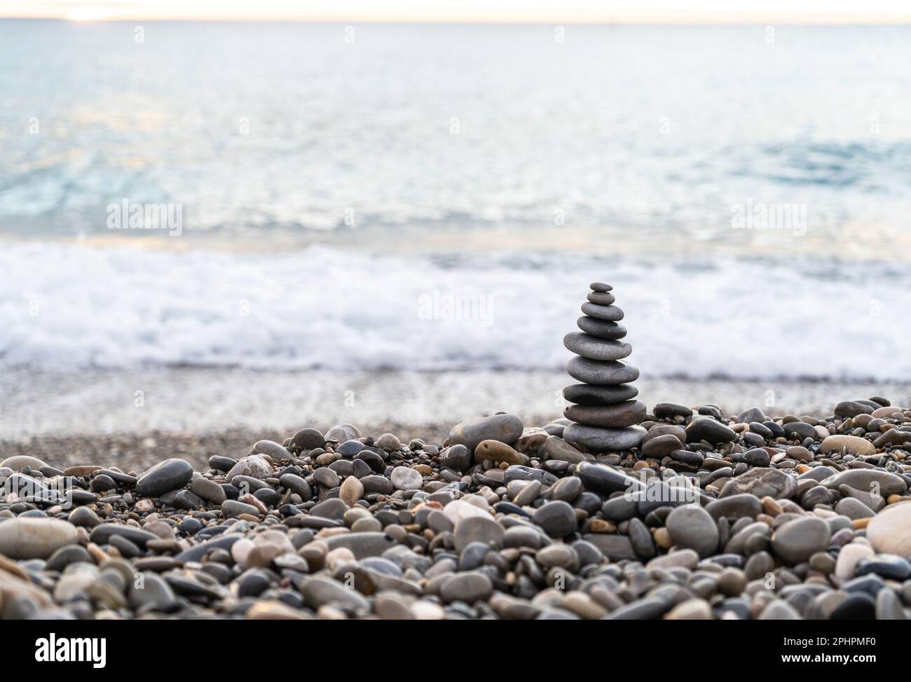 Stone pyramid. Pebbles balance pile, harmony zen stones, balance stack ...