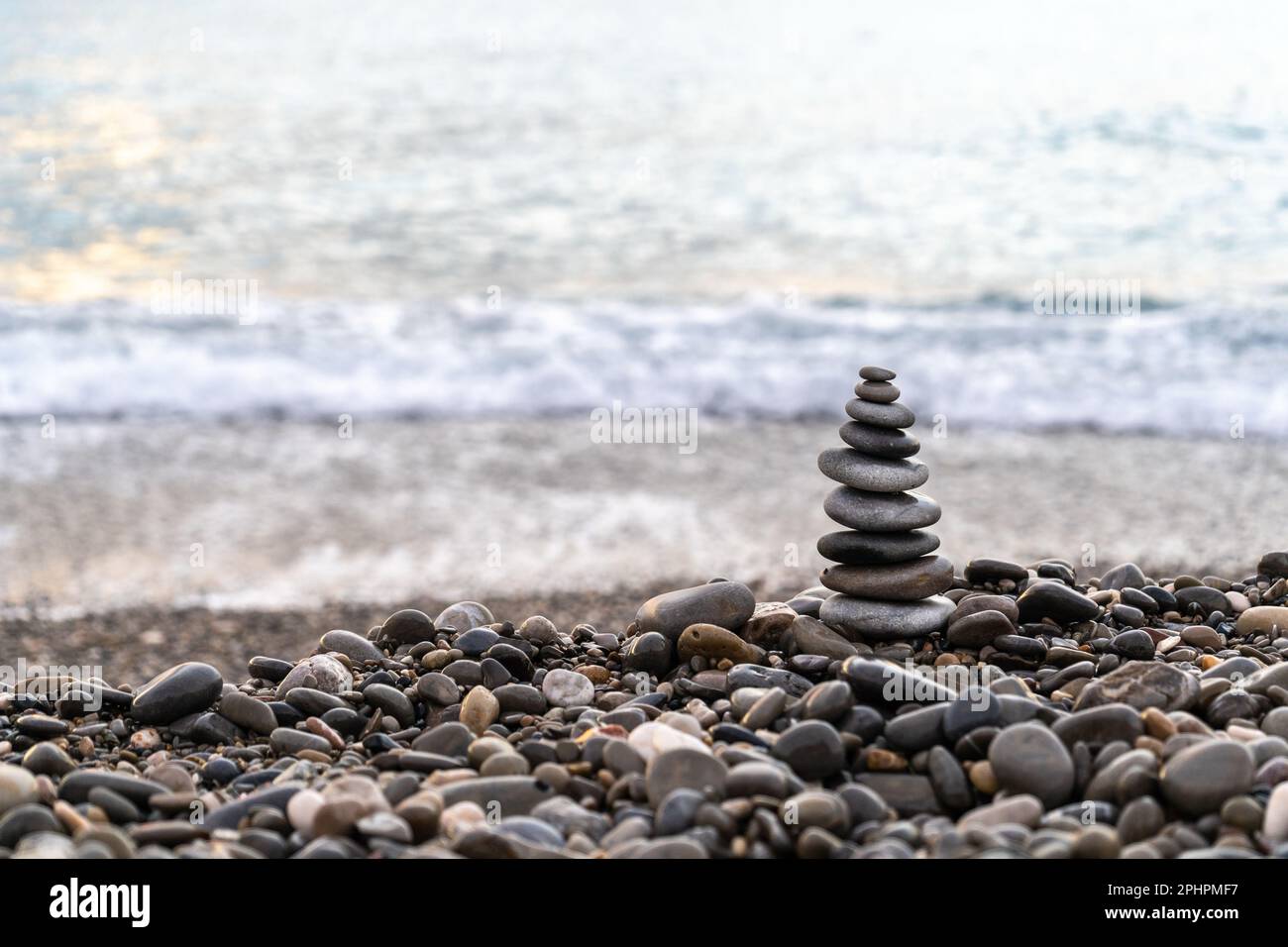 Stone pyramid. Pebbles balance pile, harmony zen stones, balance stack ...