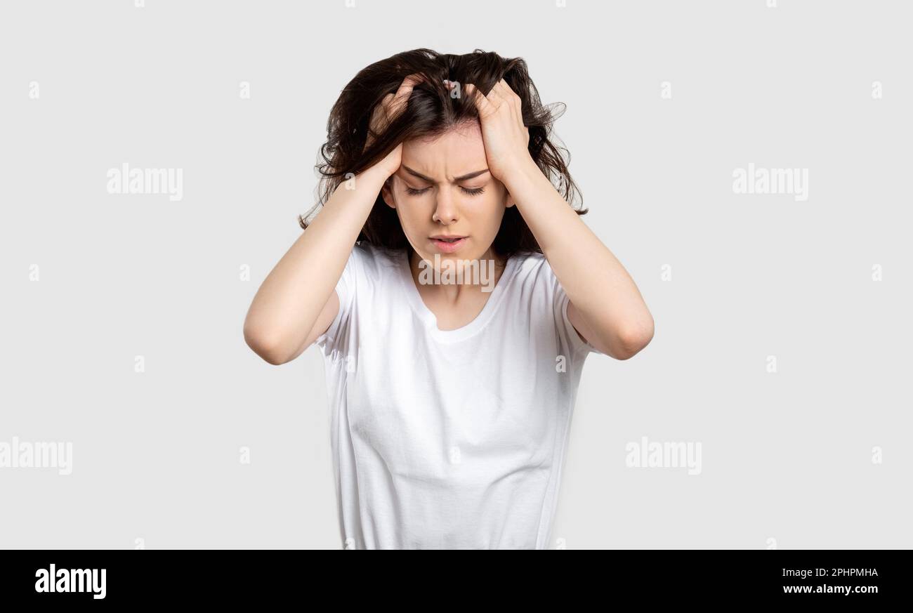 frustrated woman portrait mental disorder headache Stock Photo - Alamy