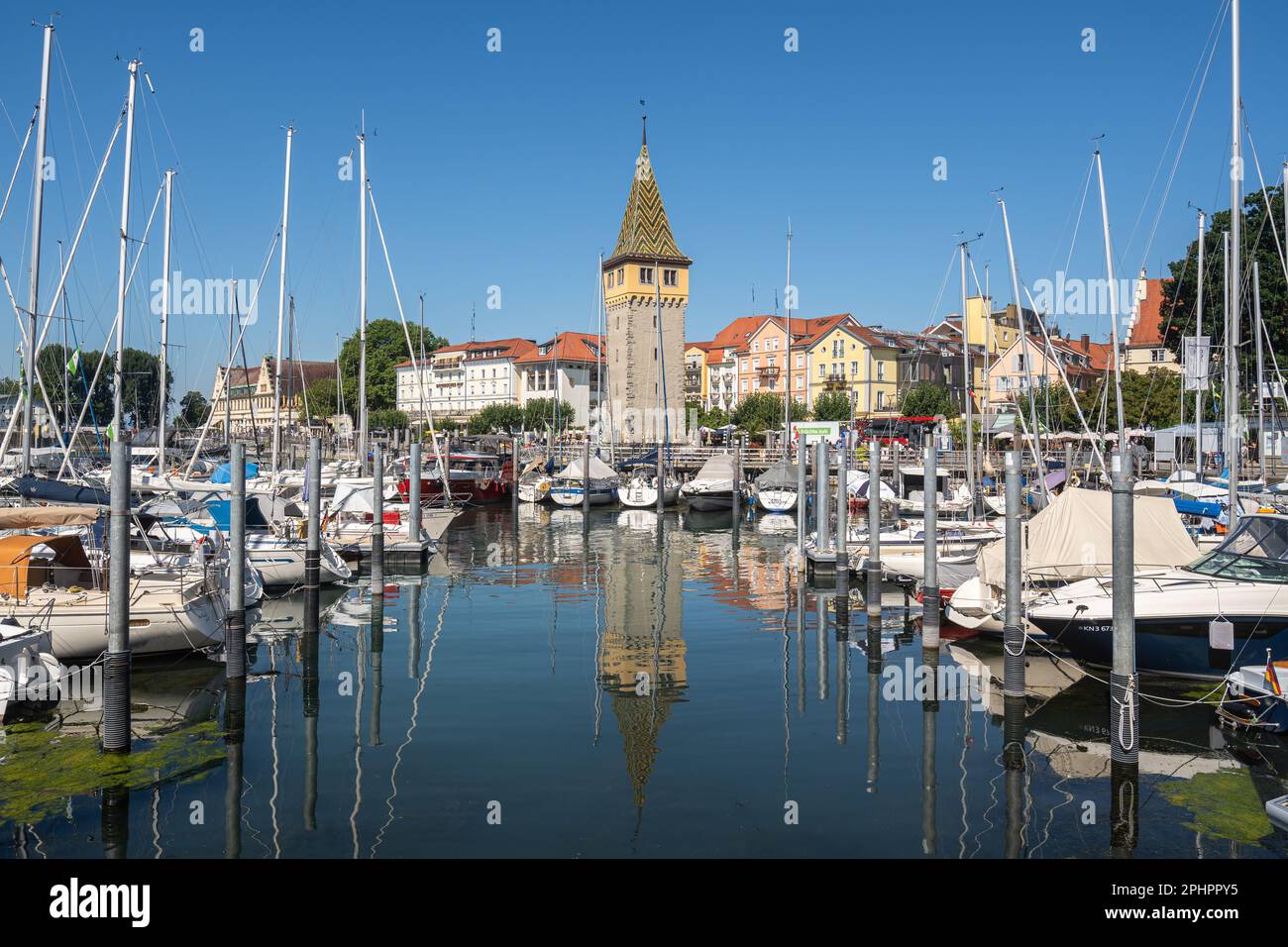 The picturesque port of Lindau with the Mangenturm. Lindau is a popular ...