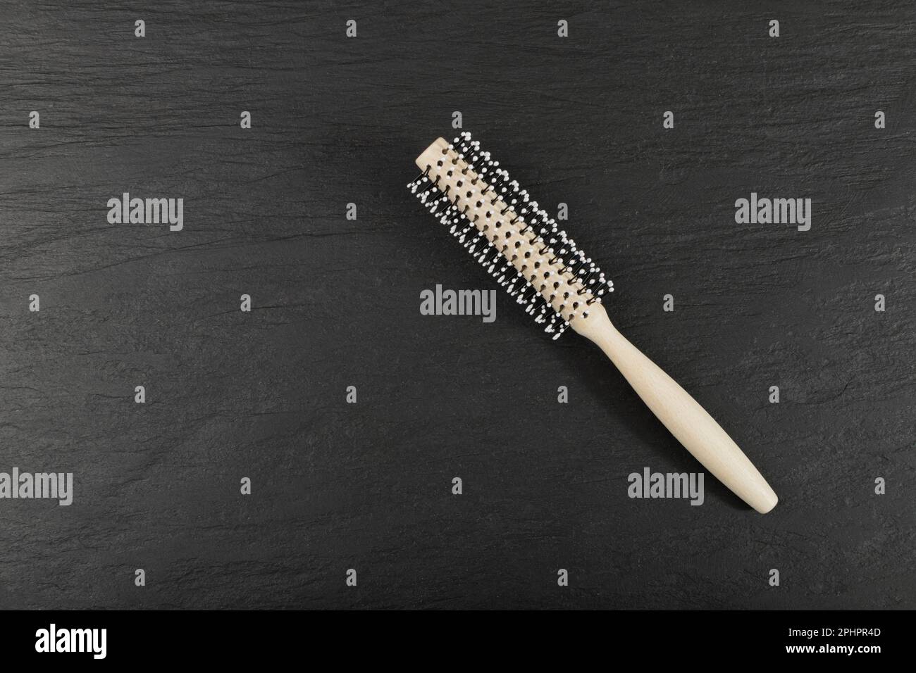 Wood Round Hairbrush on Black Stone Texture Background, Natural Wooden ...