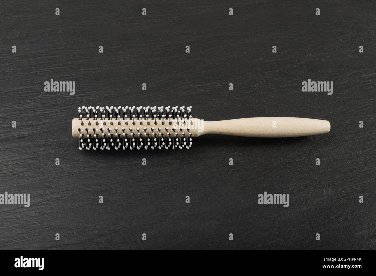 Wood Round Hairbrush on Black Stone Texture Background, Natural Wooden ...