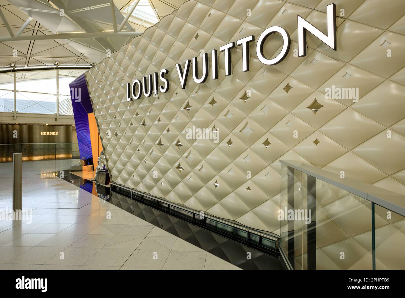 Hong Kong - February 28, 2023: Exterior of a luxury brand name retail store in the departure ...