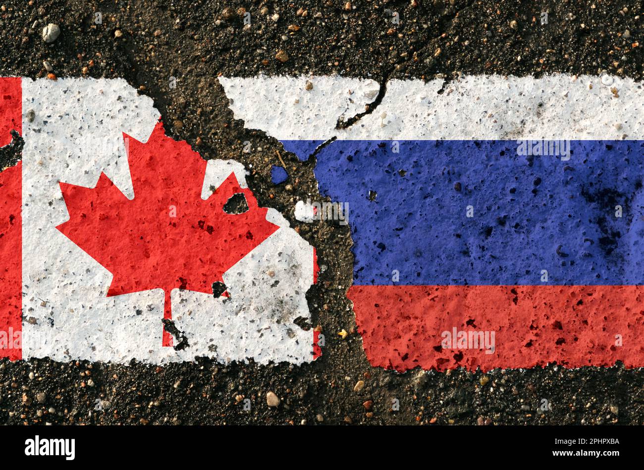 On the pavement are images of the flags of Canada and Russia, as a ...