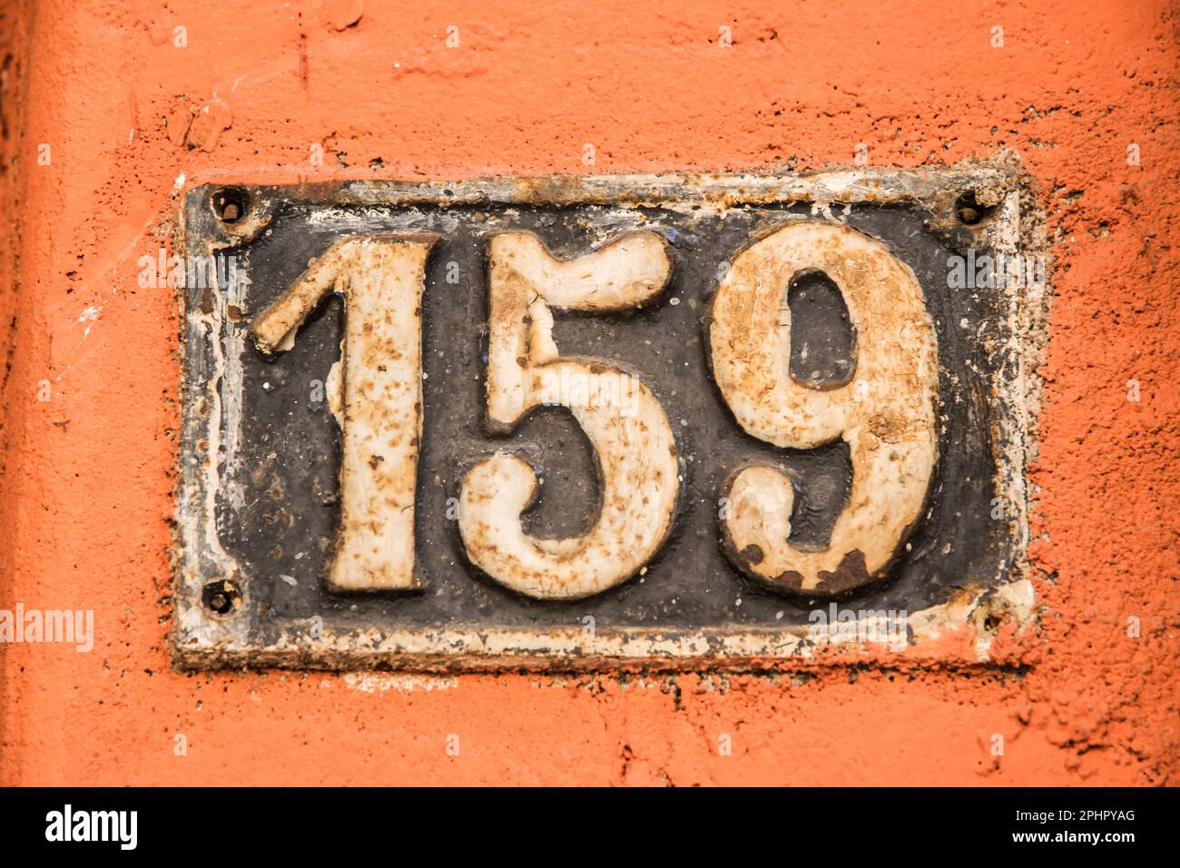 Old retro weathered cast iron plate with number 159 Stock Photo - Alamy