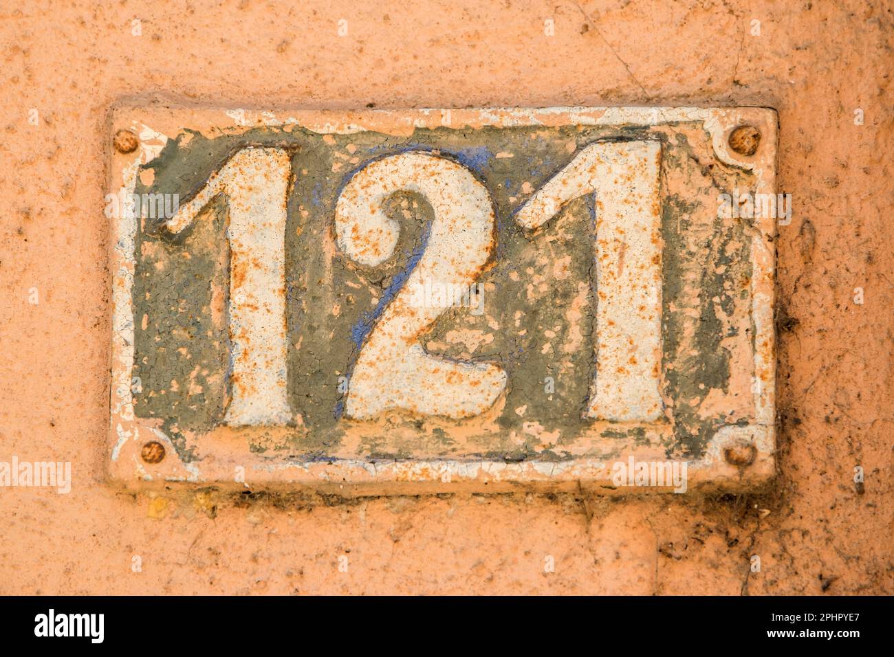 Old retro weathered cast iron plate with number 121 Stock Photo - Alamy