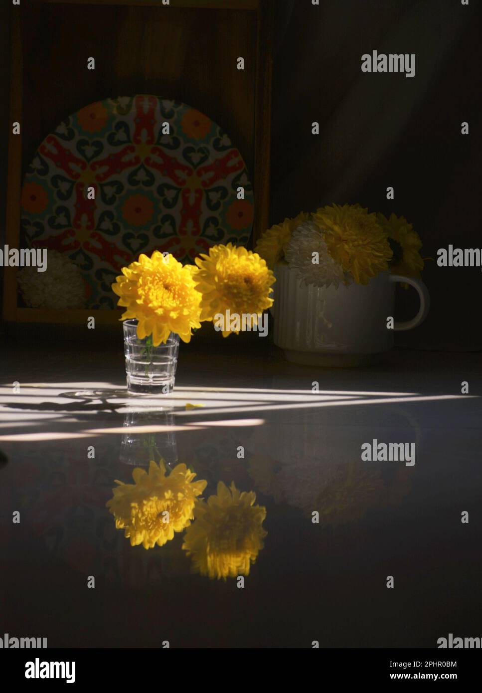 Still life with yellow flowers Stock Photo - Alamy
