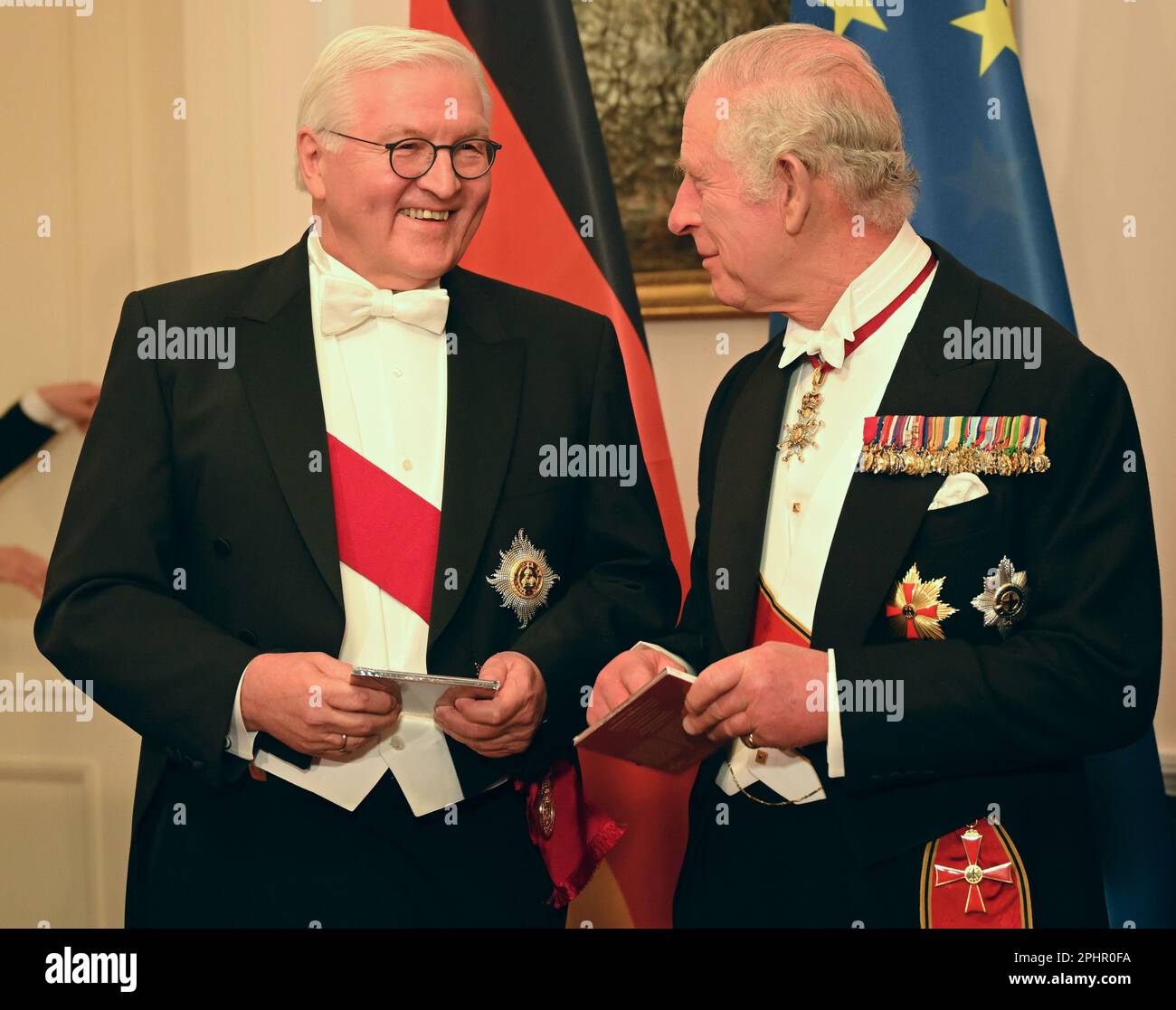 Berlin, Germany. 29th Mar, 2023. King Charles III (r) speaks with ...