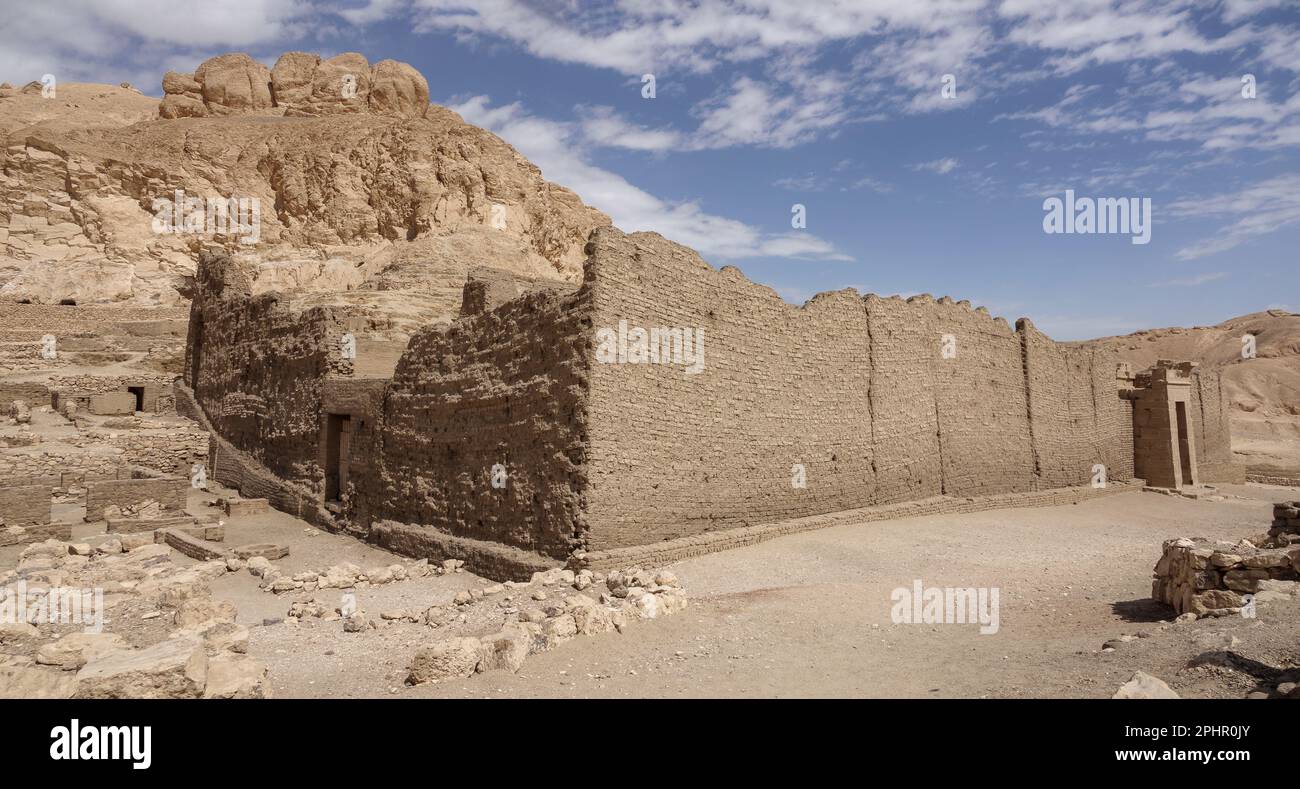 The mud brick walls surrounding The Ptolemaic Temple at Deir el-Medina ...