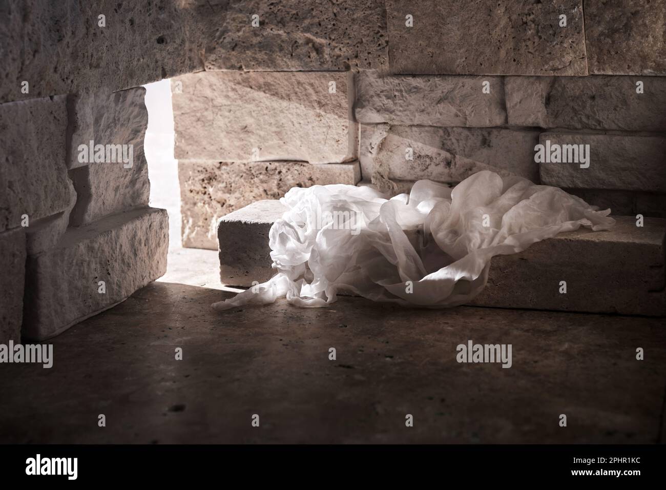 Empty tomb while light shines from the outside. Jesus Christ ...