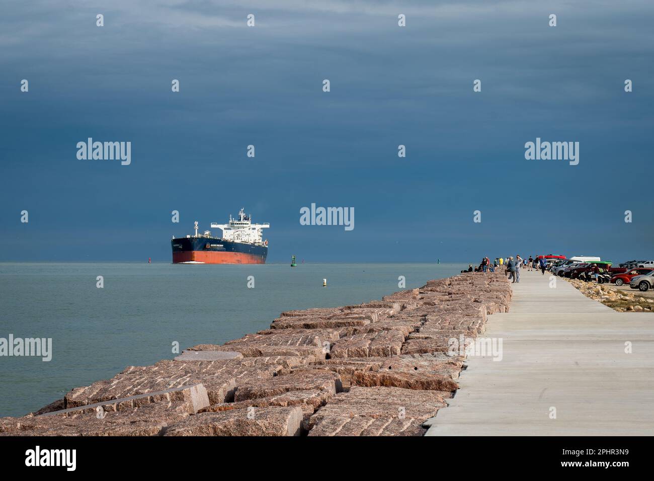 PORT ARANSAS, TX – 7 FEB 2023: The South Jetty concrete sidewalk, with ...
