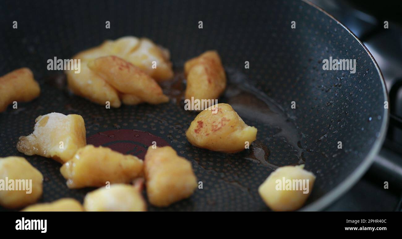 Cooking gnocchi at flying pan close-up food Stock Photo - Alamy