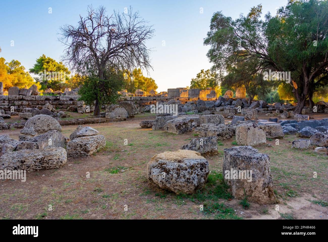Sunset view of Temple of Zeus at Archaeological Site of Olympia in ...