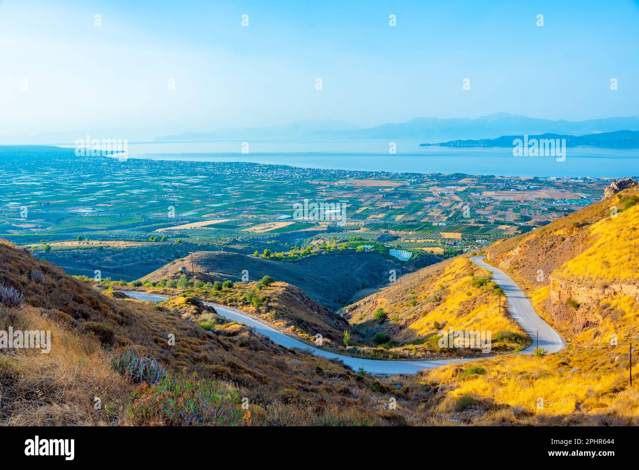 Agricultural landscape alongside Gulf of Corinth in Greece Stock Photo ...