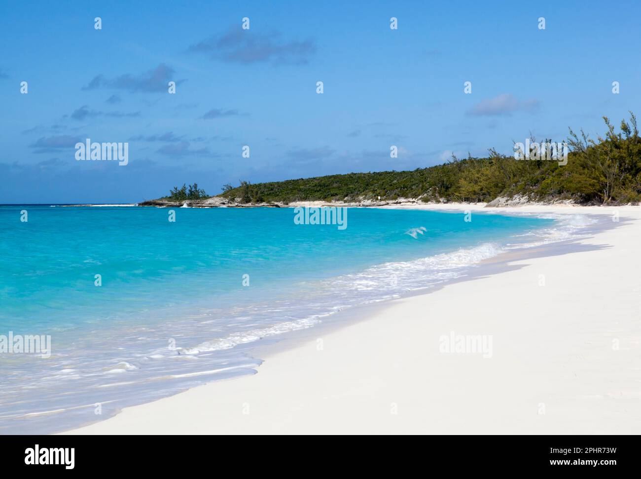 The scenic view of an empty beach and turquoise color sea on Half Moon ...