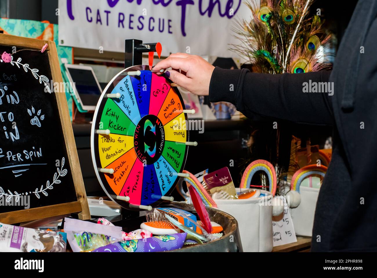 A close-up of a spinning game wheel in motion with a vibrant colorful ...