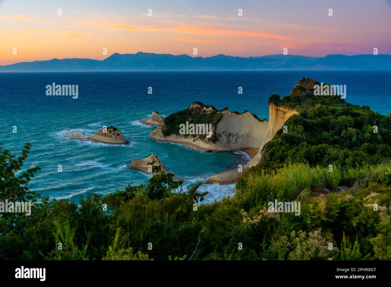 Sunset view of Cape Drastis a Corfu island, Greece Stock Photo - Alamy