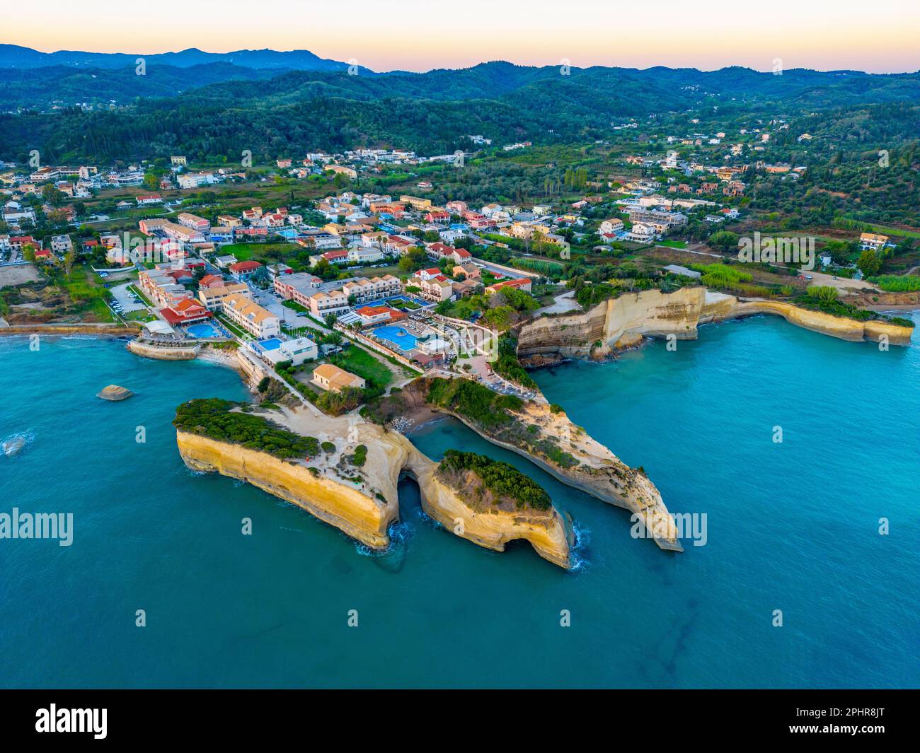 Aerial panorama of beach and coastal town at dawn hi-res stock ...
