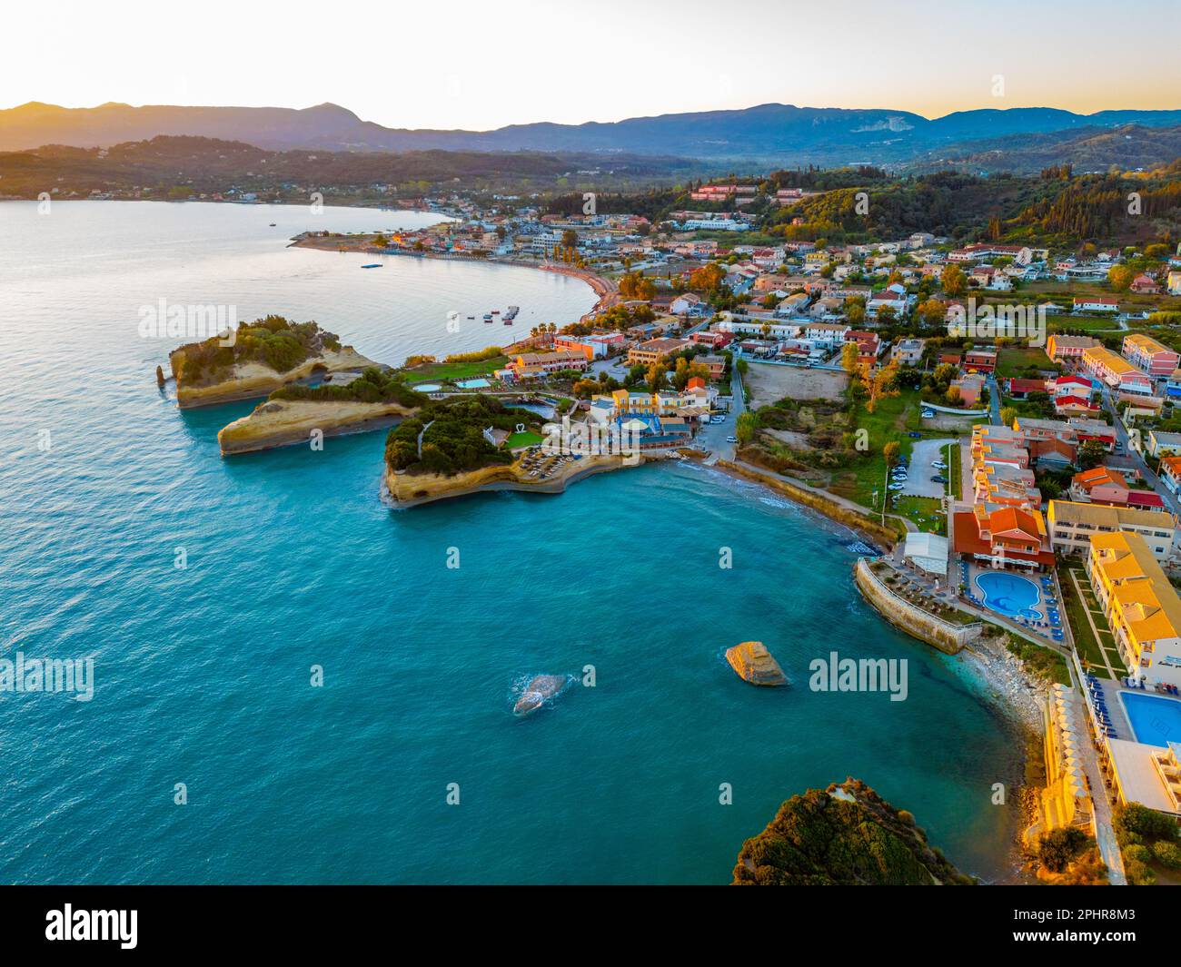 Aerial panorama of beach and coastal town at dawn hi-res stock ...