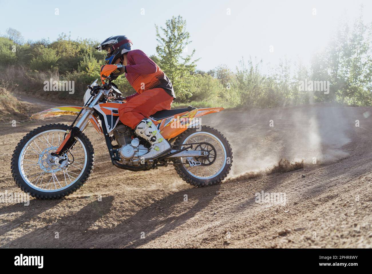 Man riding motorbike on motocross track Stock Photo - Alamy