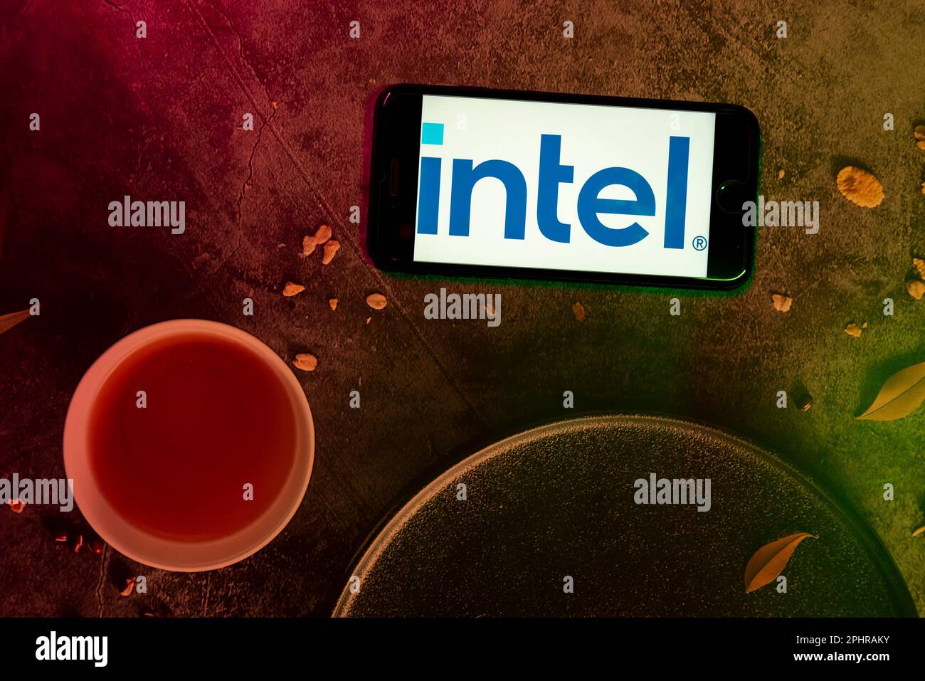 In this photo illustration, the Intel logo is seen displayed on a ...
