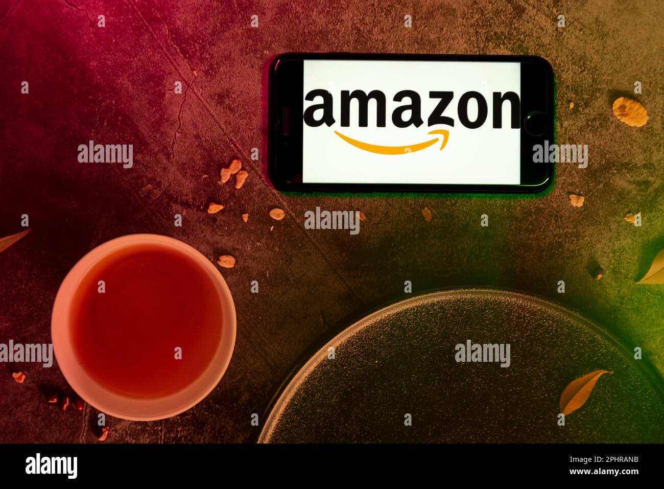 In this photo illustration, the Amazon logo is seen displayed on a ...