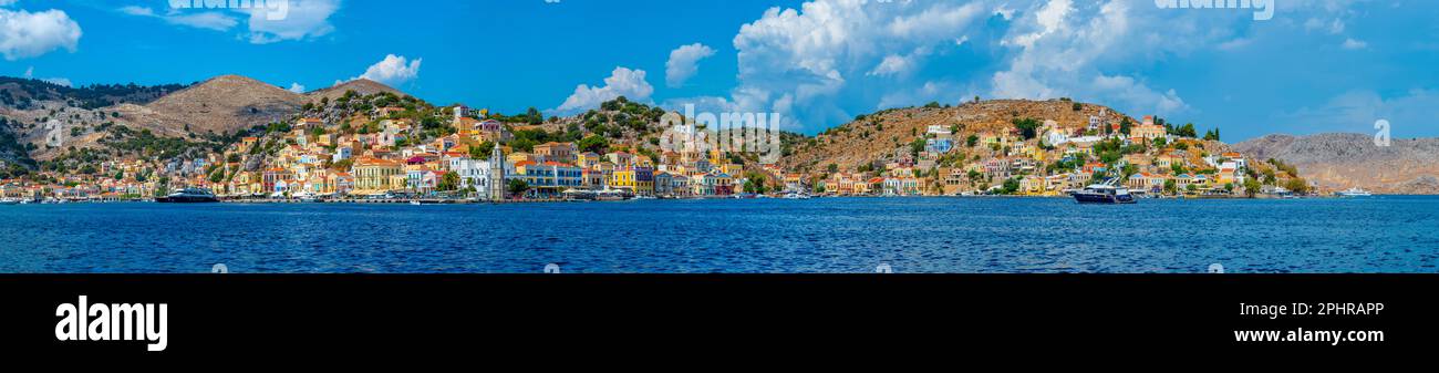 Colourful houses at waterfront of Greek island Symi Stock Photo - Alamy